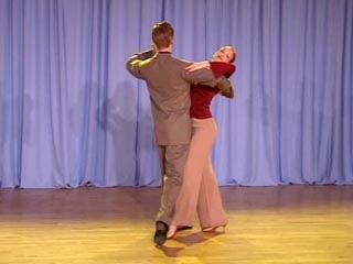Learn to Dance the Quickstep Reverse Pivot with BallroomDancers.com!